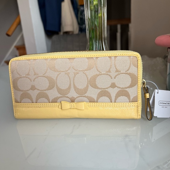 Coach | Bags | Nwt Coach Yellow Large Wallet With Bow And Signature ...
